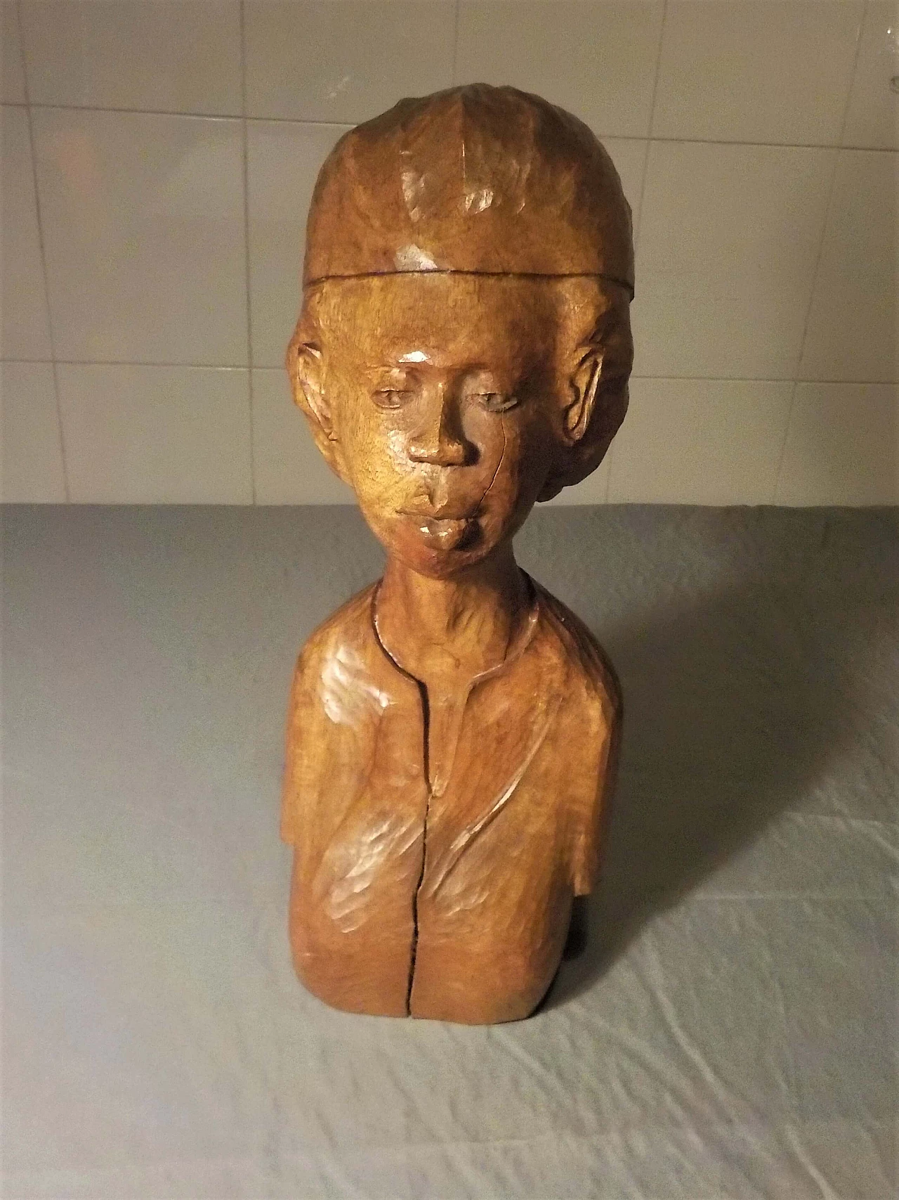 Hand-carved wooden bust sculpture of a woman, 1982 | intOndo