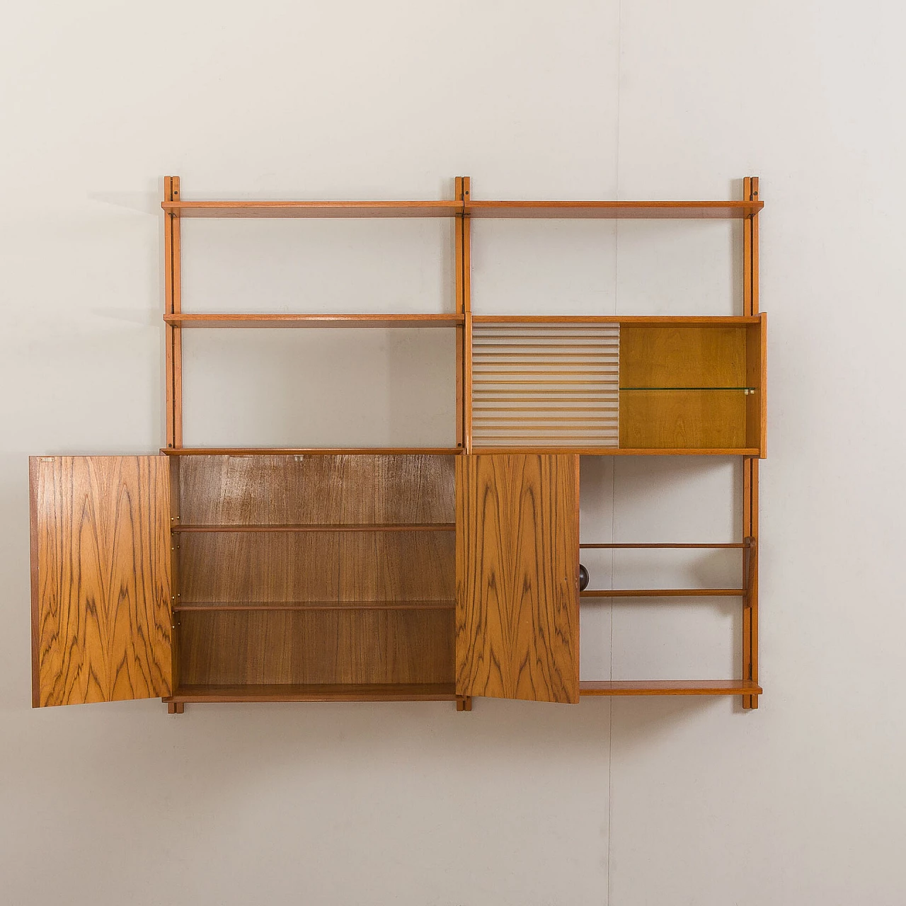 Modular teak hanging bookcase by Sven Andersen, 1960s | intOndo