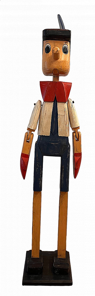 Wood Pinocchio sculpture with jointed arms, 1960s | intOndo