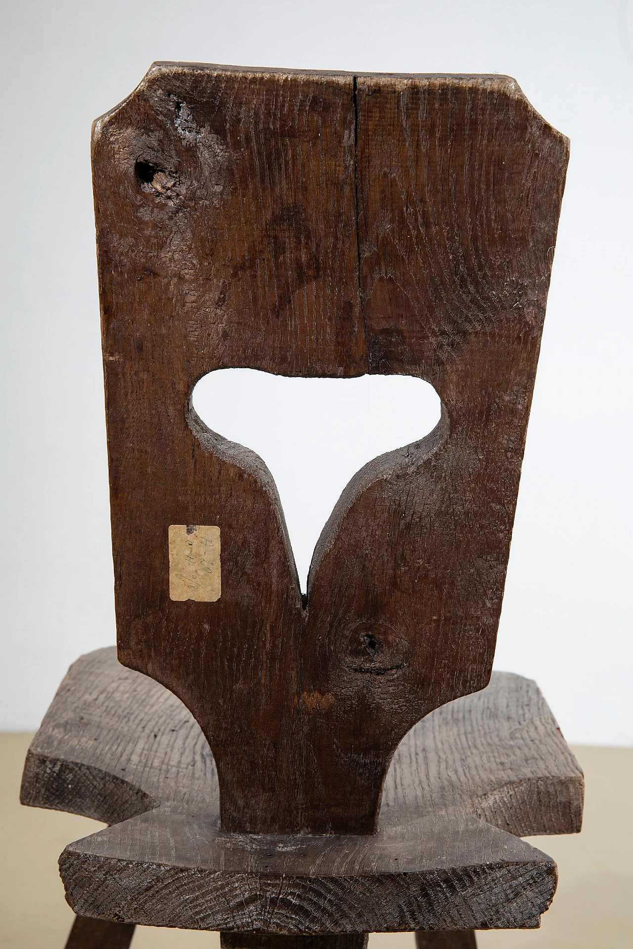 Wooden milking chair with three legs, 1940s | intOndo